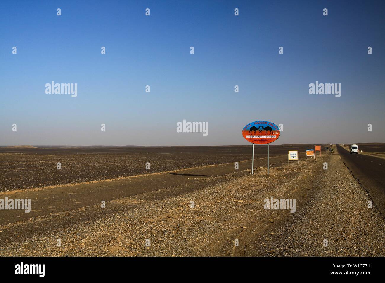 ERG CHEBBI (SAHARA), MOROCCO - SEPTEMBER 25. 2011: Lost isolated road ...