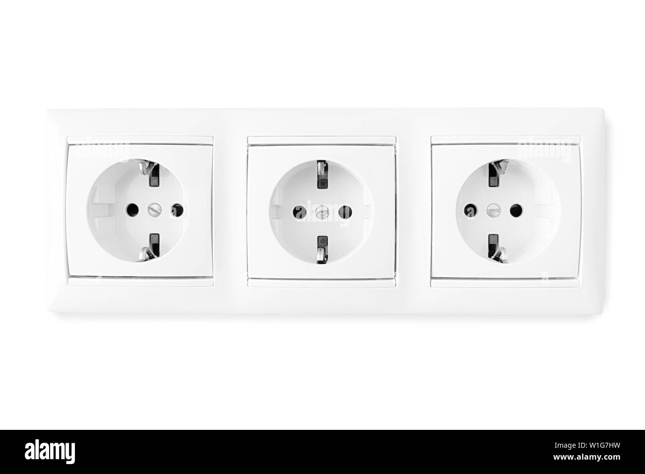 White triple electrical outlet. Isolated on white, clipping path ...