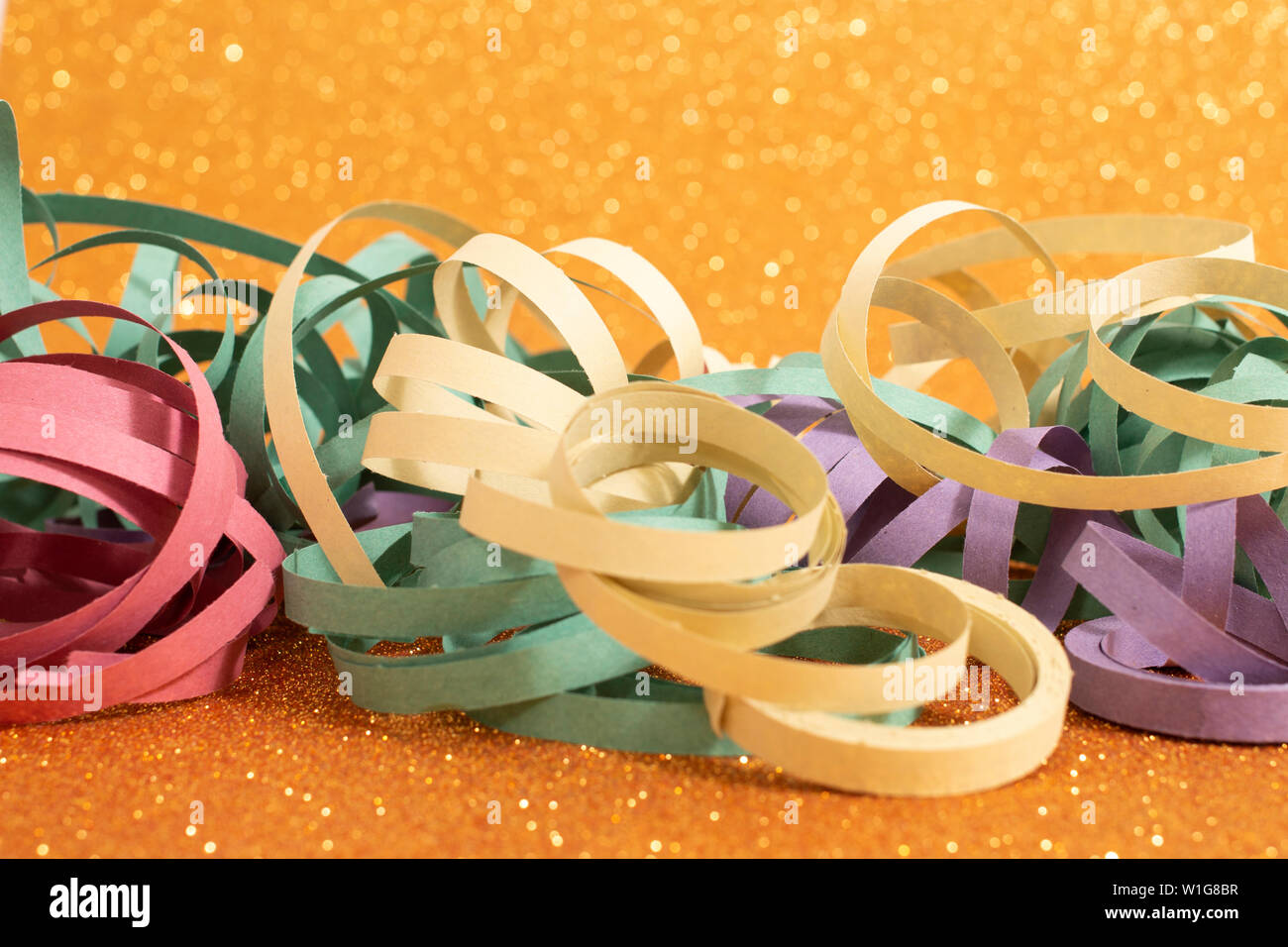 Golden serpentine streamers on hi-res stock photography and images - Alamy