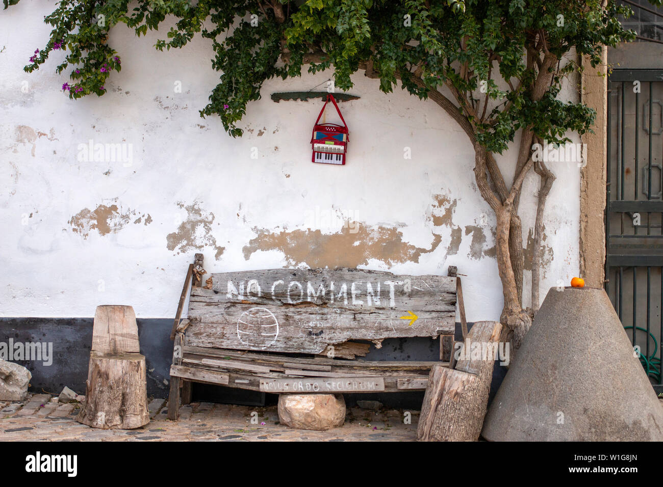 Very old broken park bench on faro city, Portugal Stock Photo - Alamy