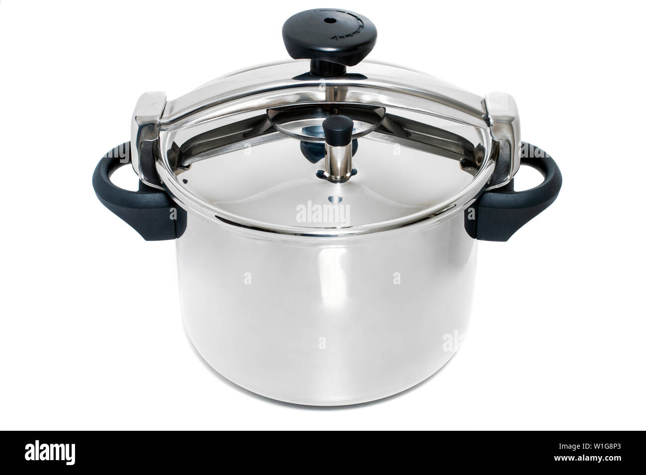 Close up view of a stainless steel pressure cooking pan isolated on a ...