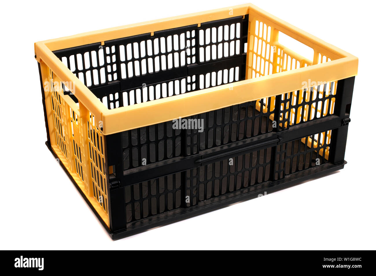 yellow folding box isolated on a white background Stock Photo - Alamy