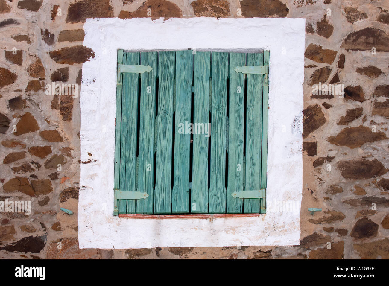 Close up view of a traditional portuguese wooden window on a house ...