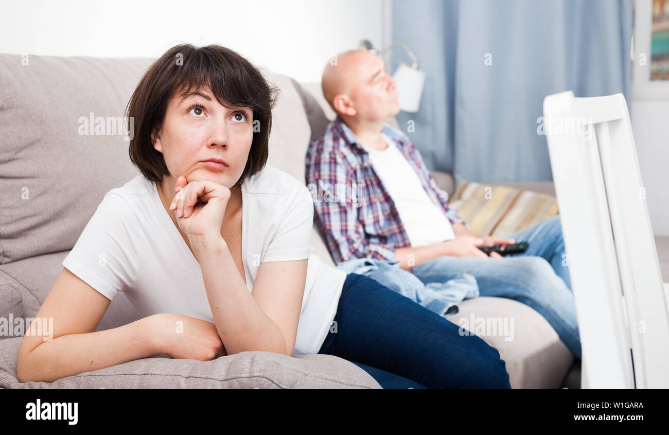 Husband watching television High Resolution Stock Photography and ...