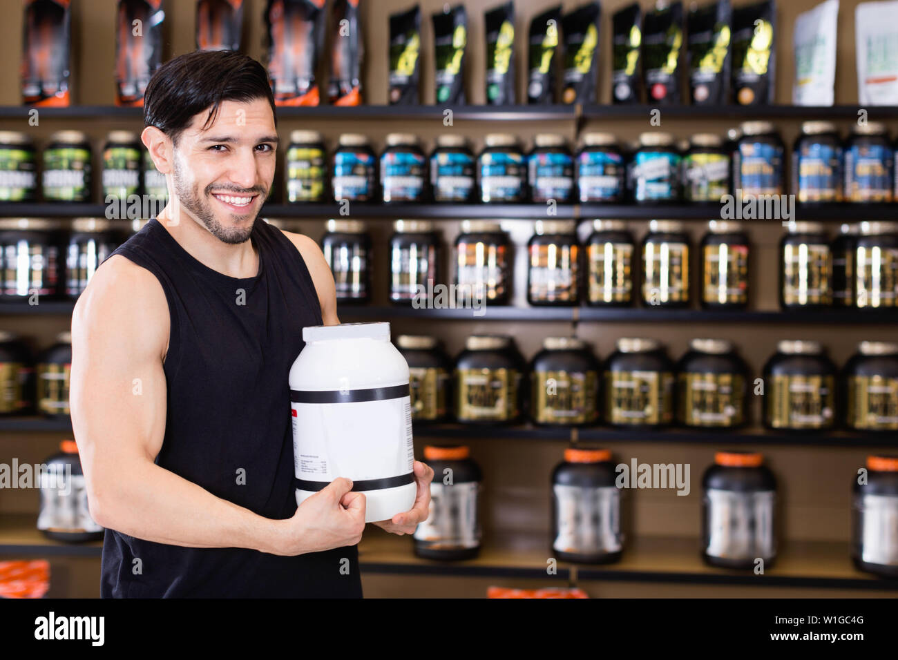 Young smiling positive bodybuilder hi-res stock photography and images ...