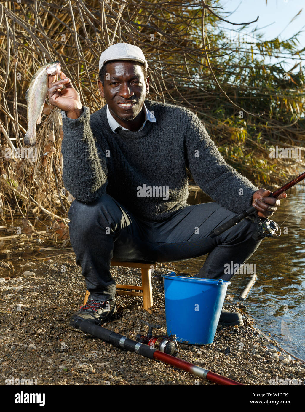 Fishman hands hi-res stock photography and images - Alamy