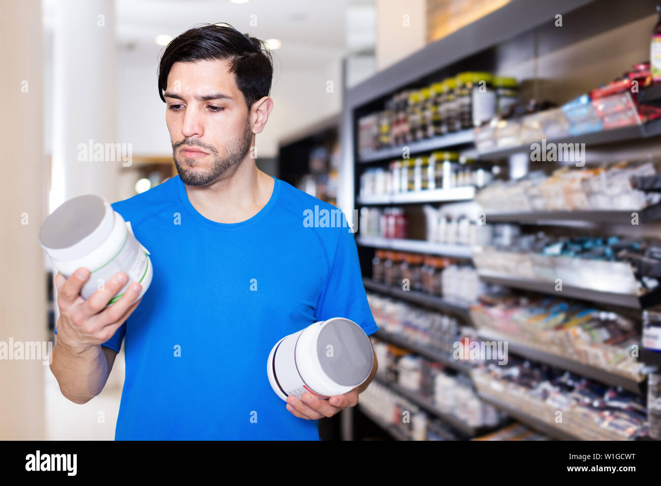 Muscular guy buying sport hi-res stock photography and images - Alamy