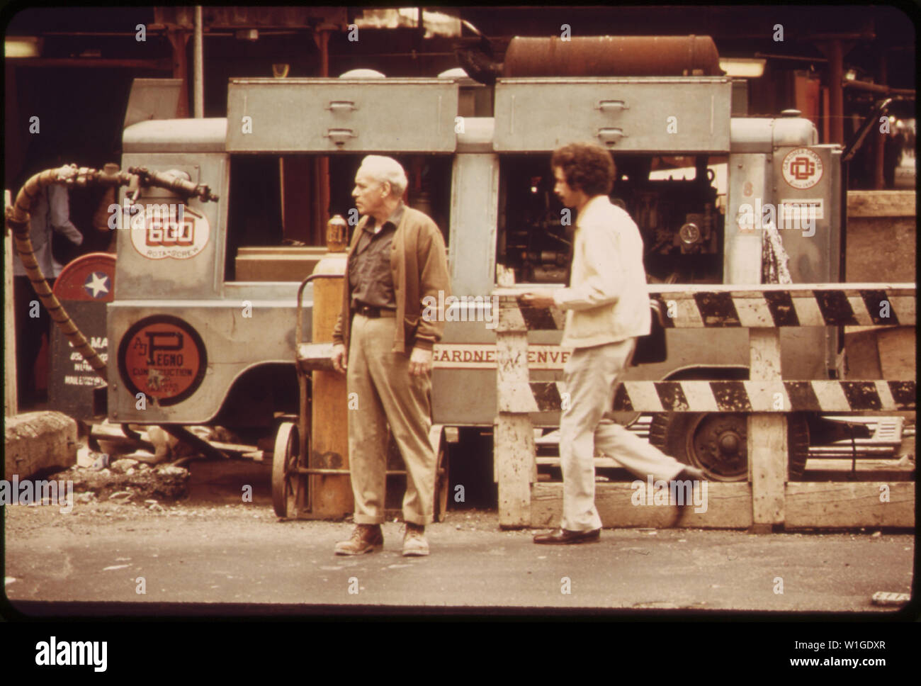 Men passing hi-res stock photography and images - Alamy