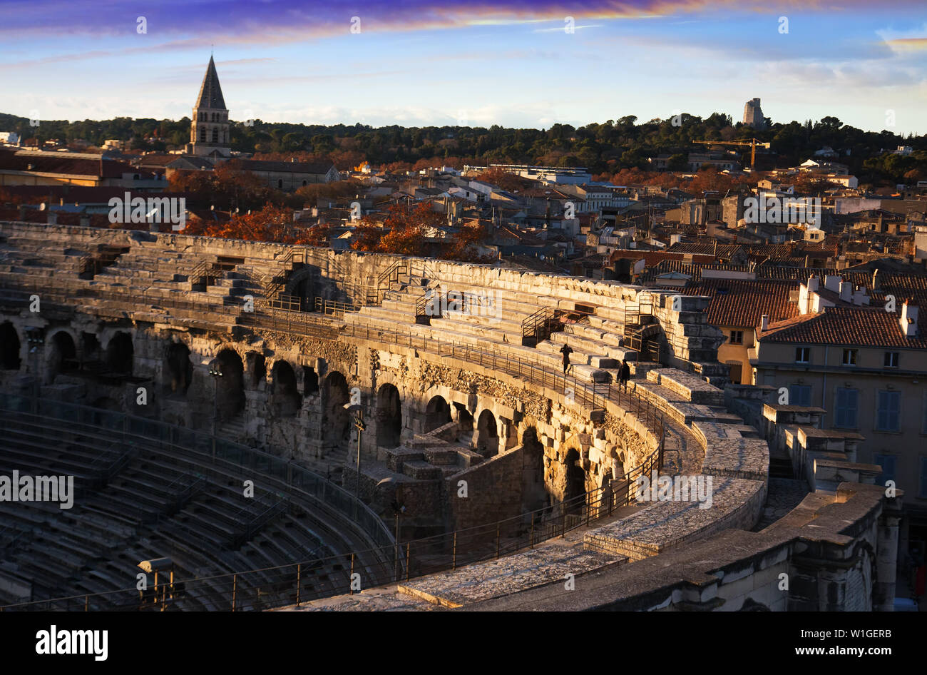 Exterior of Arena of Nimes at sunset, ancient Roman amphitheater in ...