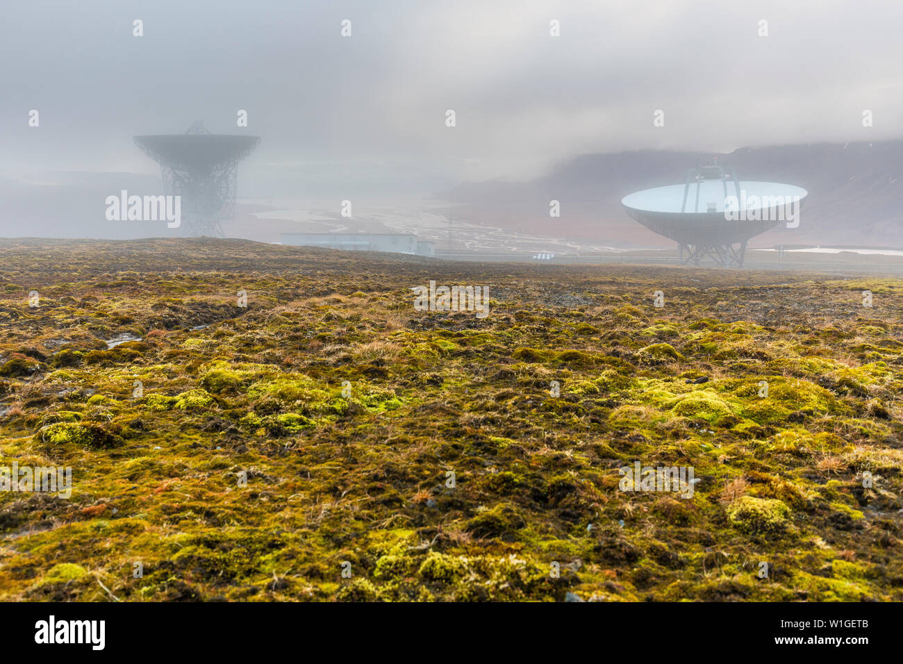 EISCAT Svalbard Radar (ESR) near Longyearbyen suroundet by fog ...