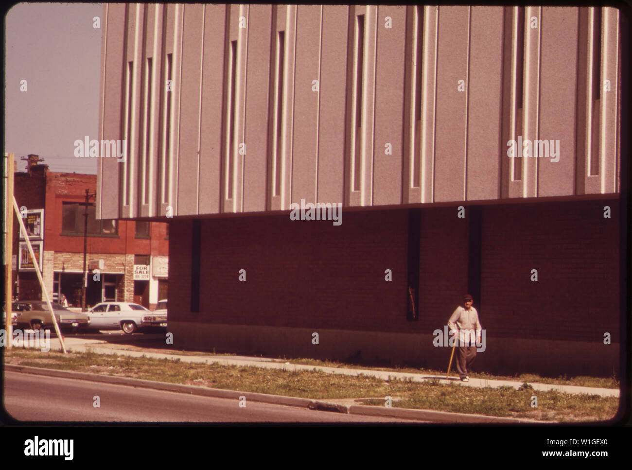 MODEL CITIES BUILDING AT 55TH AND CEDAR STREETS. OLD STORES IN ...