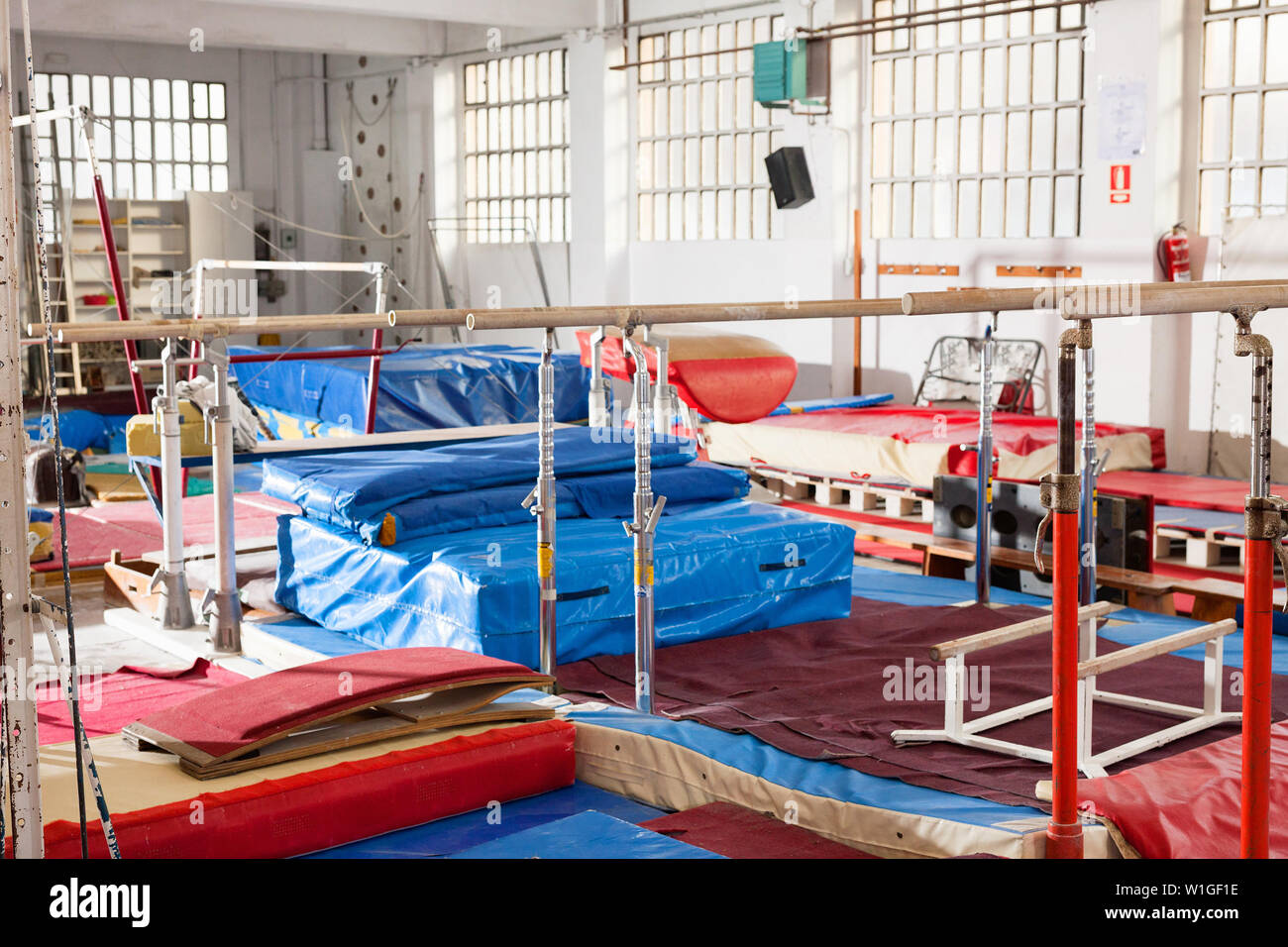 Various new gymnastic equipment at acrobatic center Stock Photo - Alamy