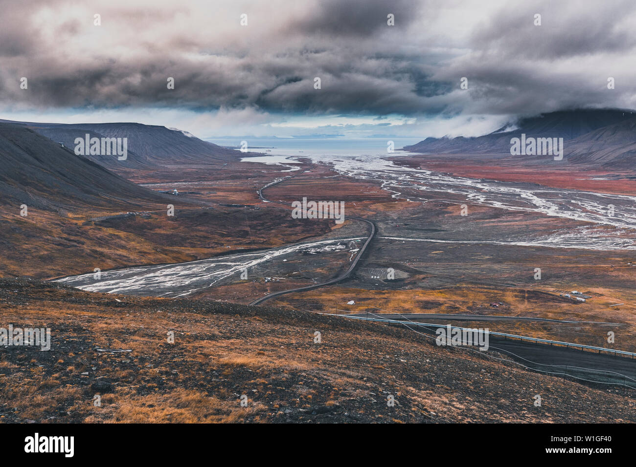 View over beautiful Adventdalen from above coal mine number 7, cloudy ...