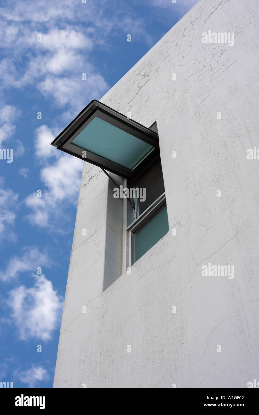 Window opened on white house with blue sky and clouds Stock Photo - Alamy