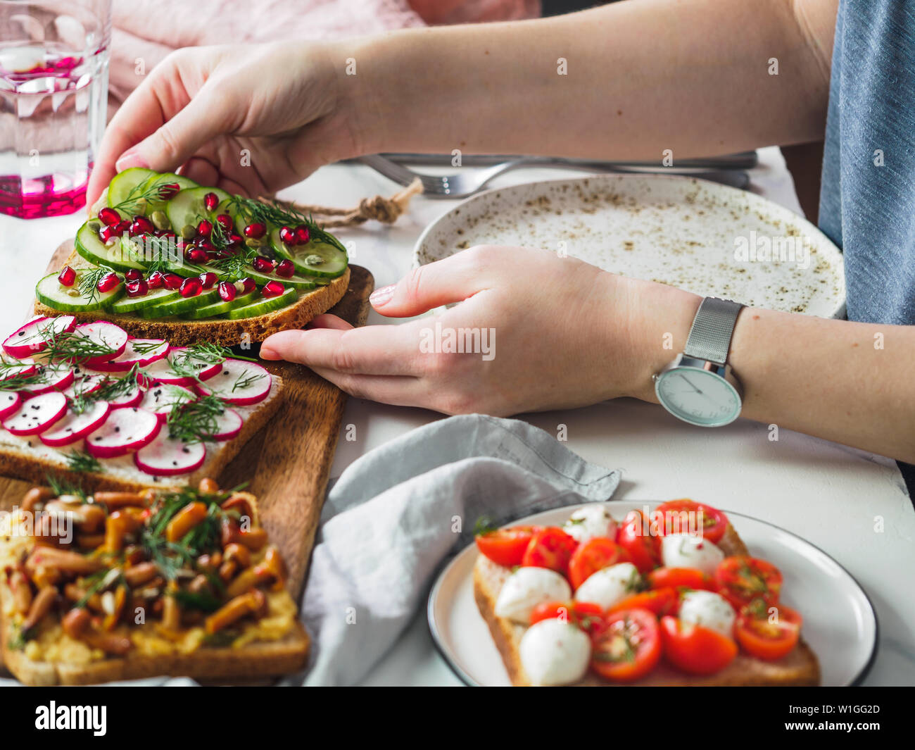 Female hand dinner table hi-res stock photography and images - Alamy