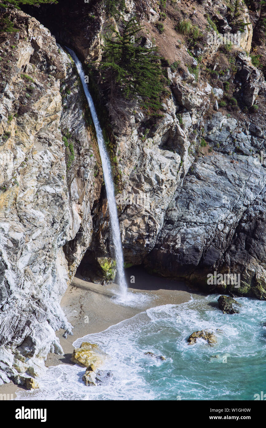 Portrait vertical Julia Pfeiffer Burns State Park waterfall, California ...