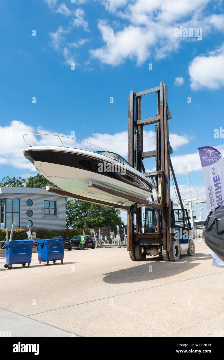 Boat lifting forklift hi-res stock photography and images - Alamy