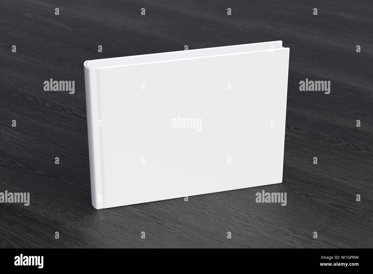 Blank horizontal book cover mock up standing on black wooden background ...
