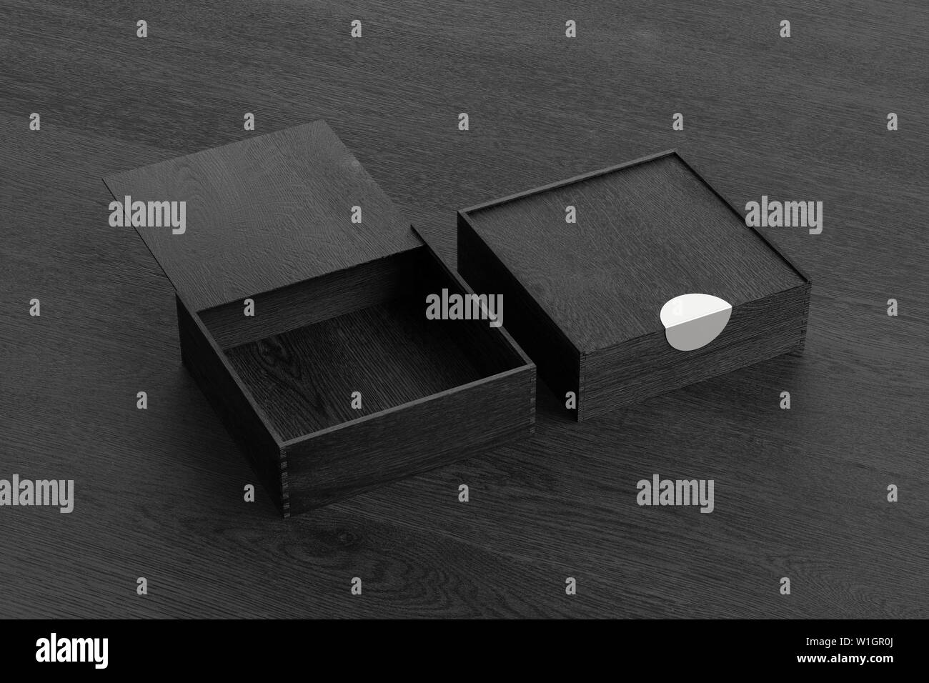 Two black wooden square boxes with sliding lid on black wooden ...