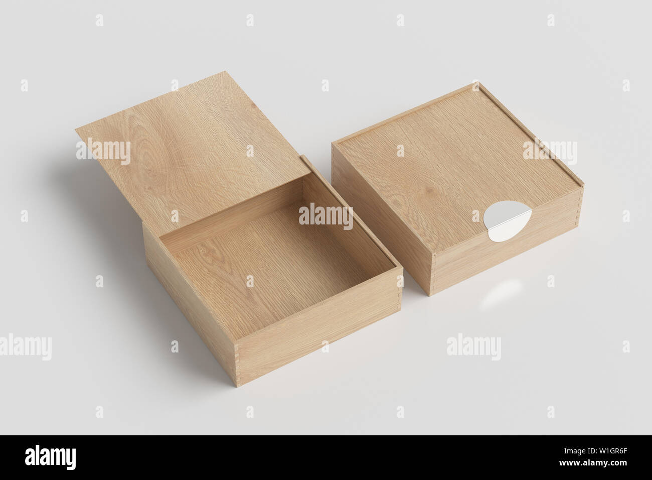 Two wooden square boxes with sliding lid on white background. Empty ...