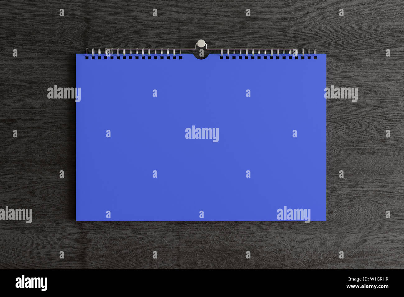 Blank blue horizontal calendar mock up on the black wooden wall. 3d ...