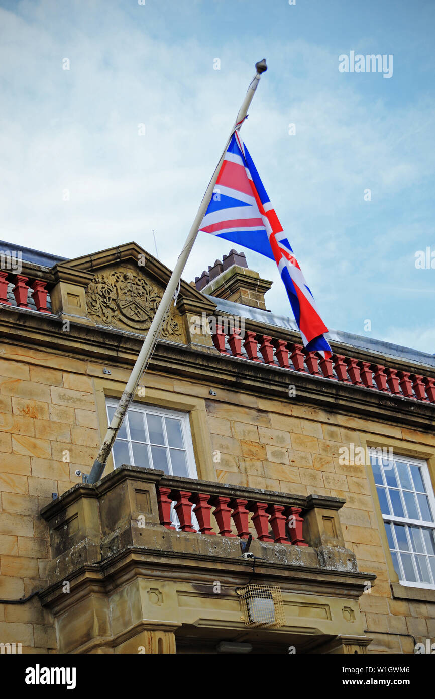 The British Flag flies on the front of Brierfield Town Hall Stock Photo ...