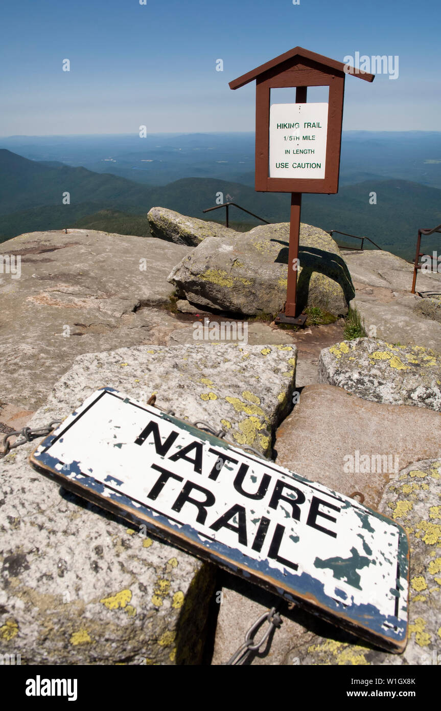 A sign on Whiteface Mountain USA showing where the nature trail is ...