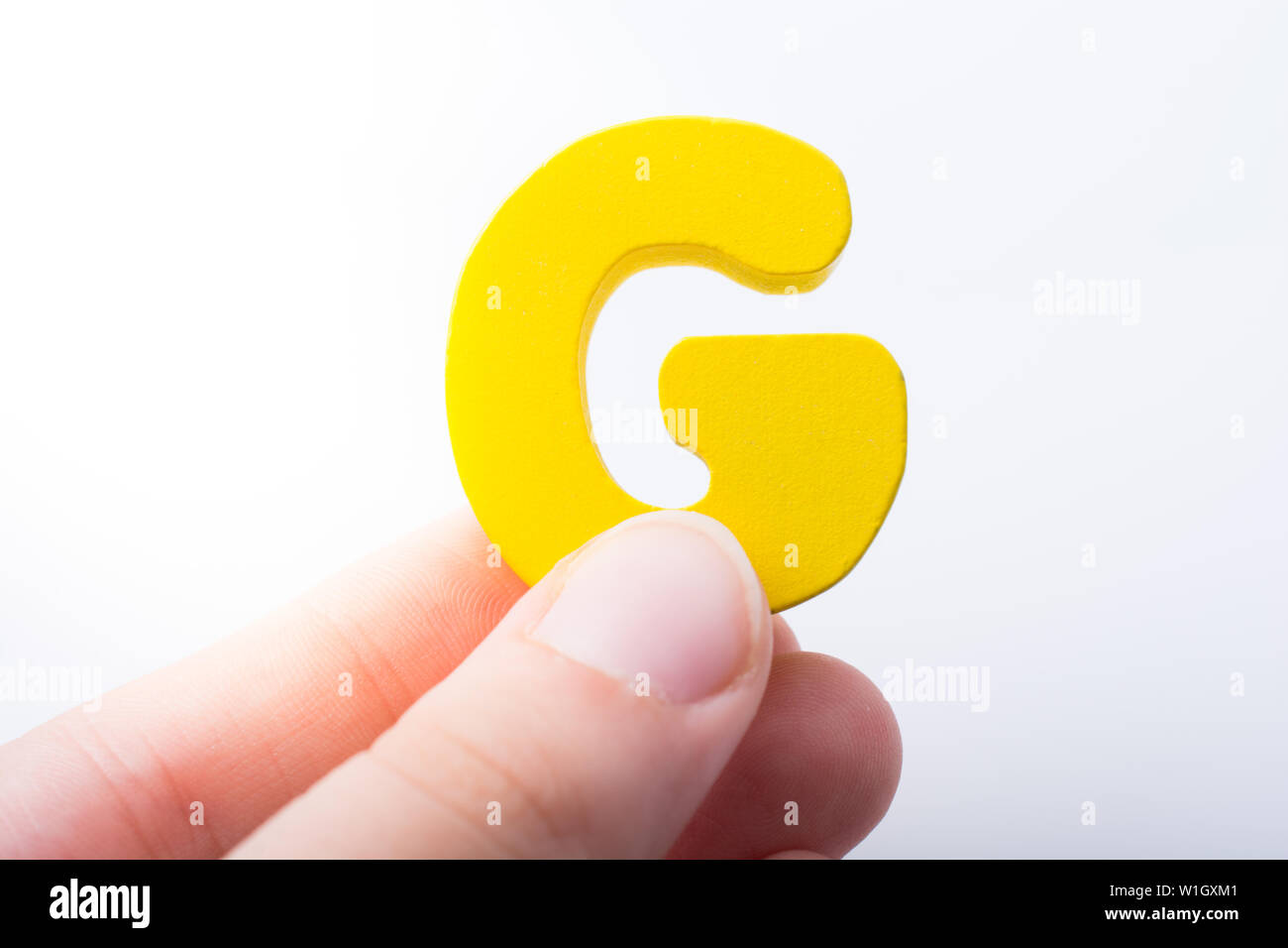 Letter cube of G of Alphabet made of wood Stock Photo - Alamy