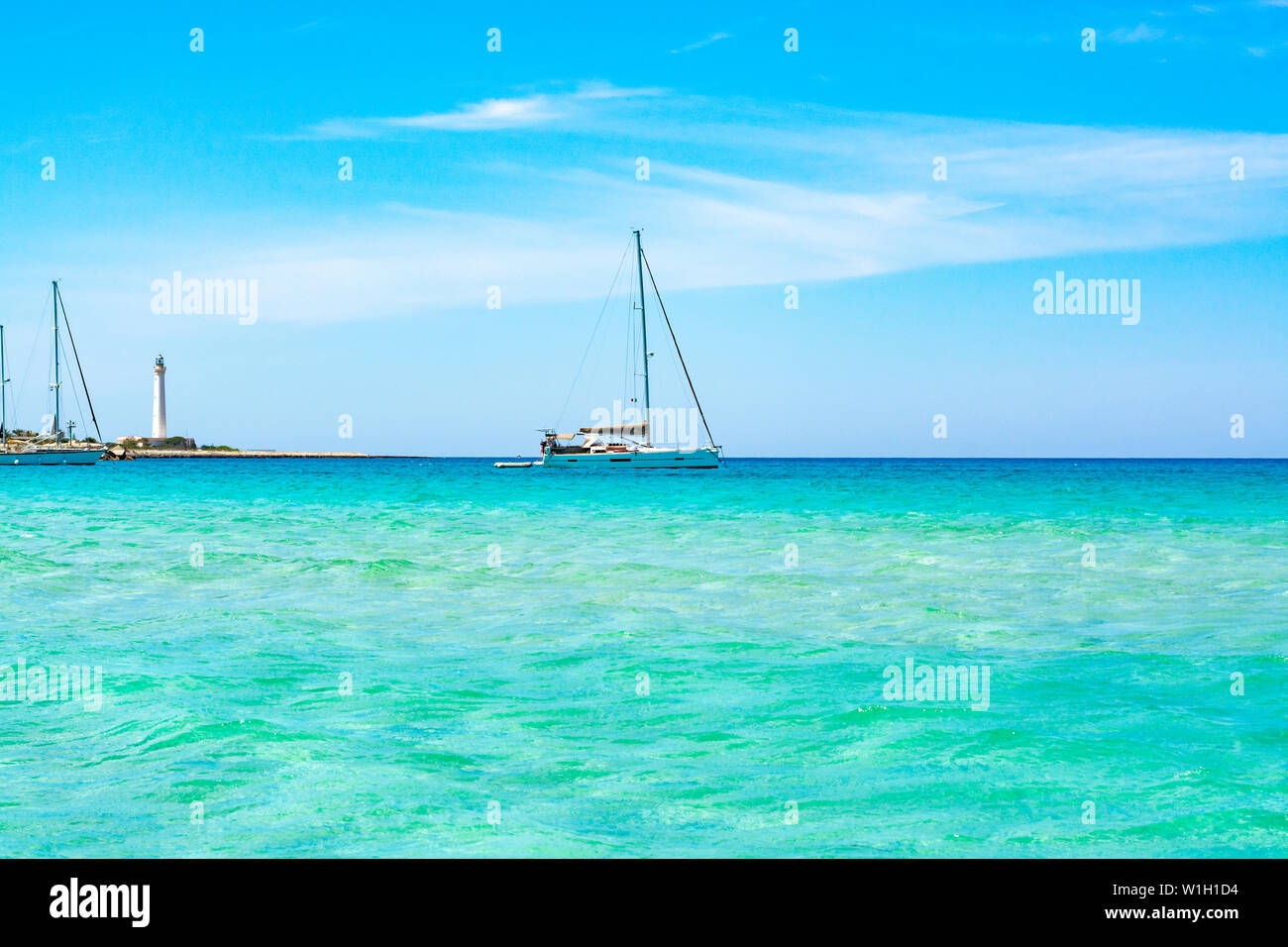 Crystal clear light blue water on sandy beach San Vito lo Capo, Sicily ...