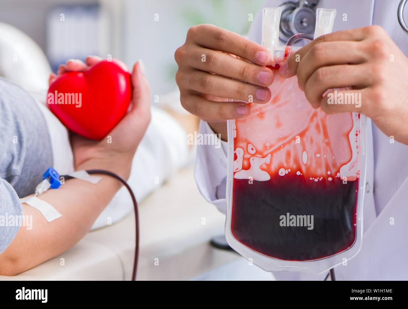 Patient getting blood transfusion in hospital clinic Stock Photo - Alamy