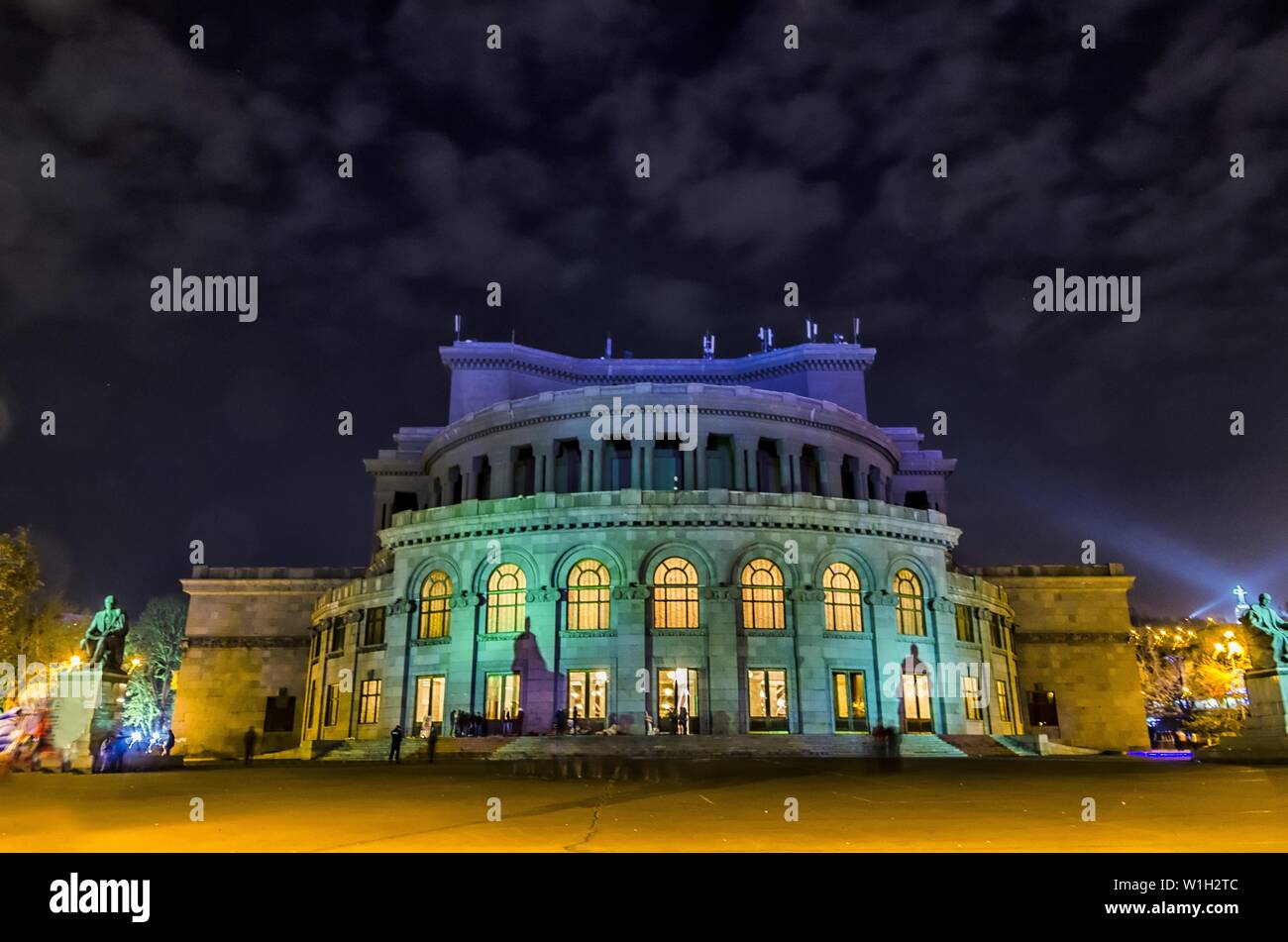 Wide low angle shot of the Opera House in Yerevan, Armenia at night ...