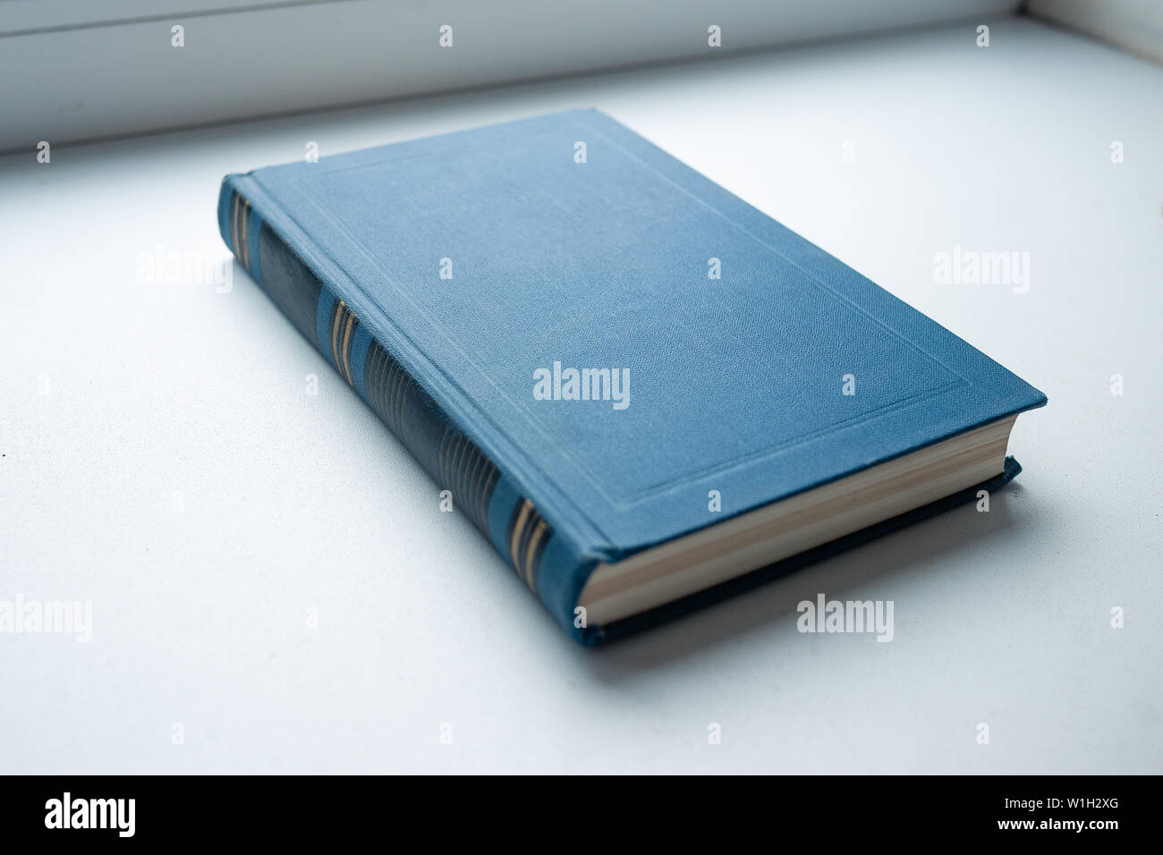 One blue beautiful closed book on white isolate background. beautiful ...
