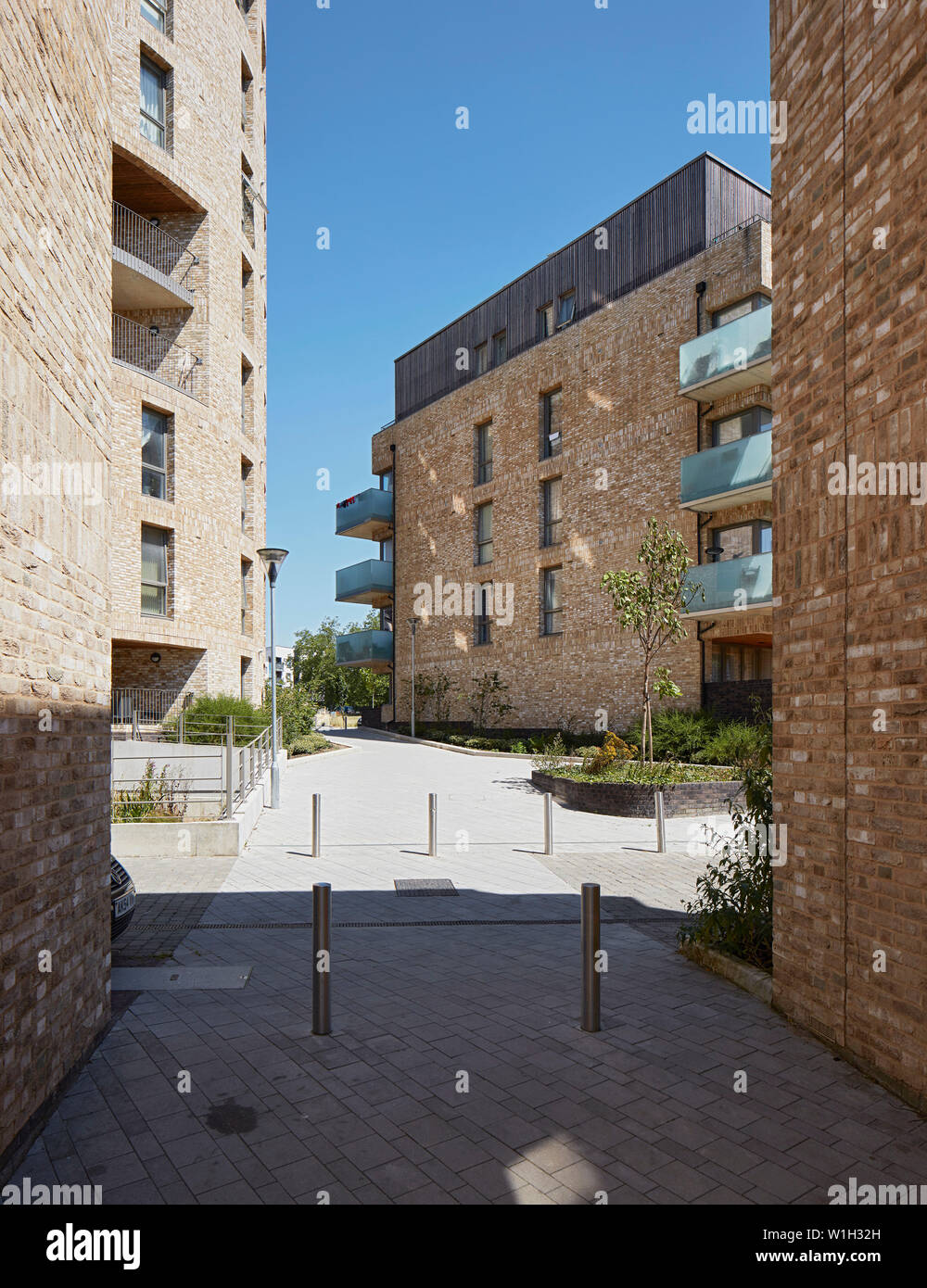 Passage through modern housing estate. Stonebridge Park, London, United ...