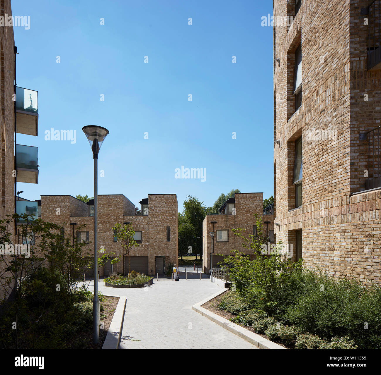 Passage through modern housing estate. Stonebridge Park, London, United ...