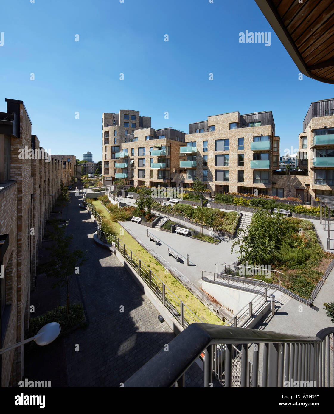 View across Stonebridge Park with landscaped garden and canal ...