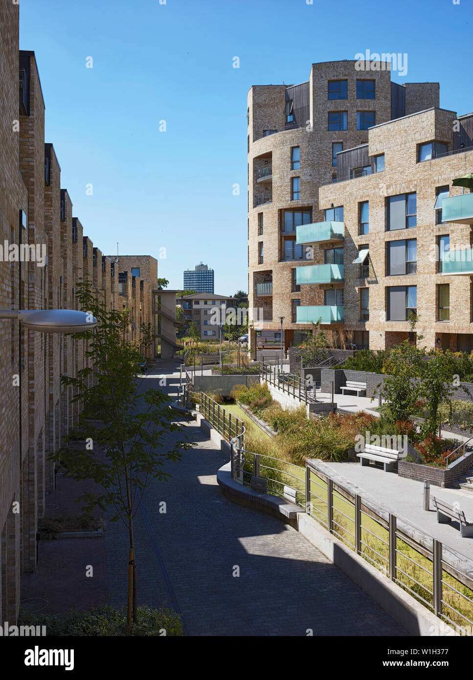 View across Stonebridge Park with landscaped garden and canal ...