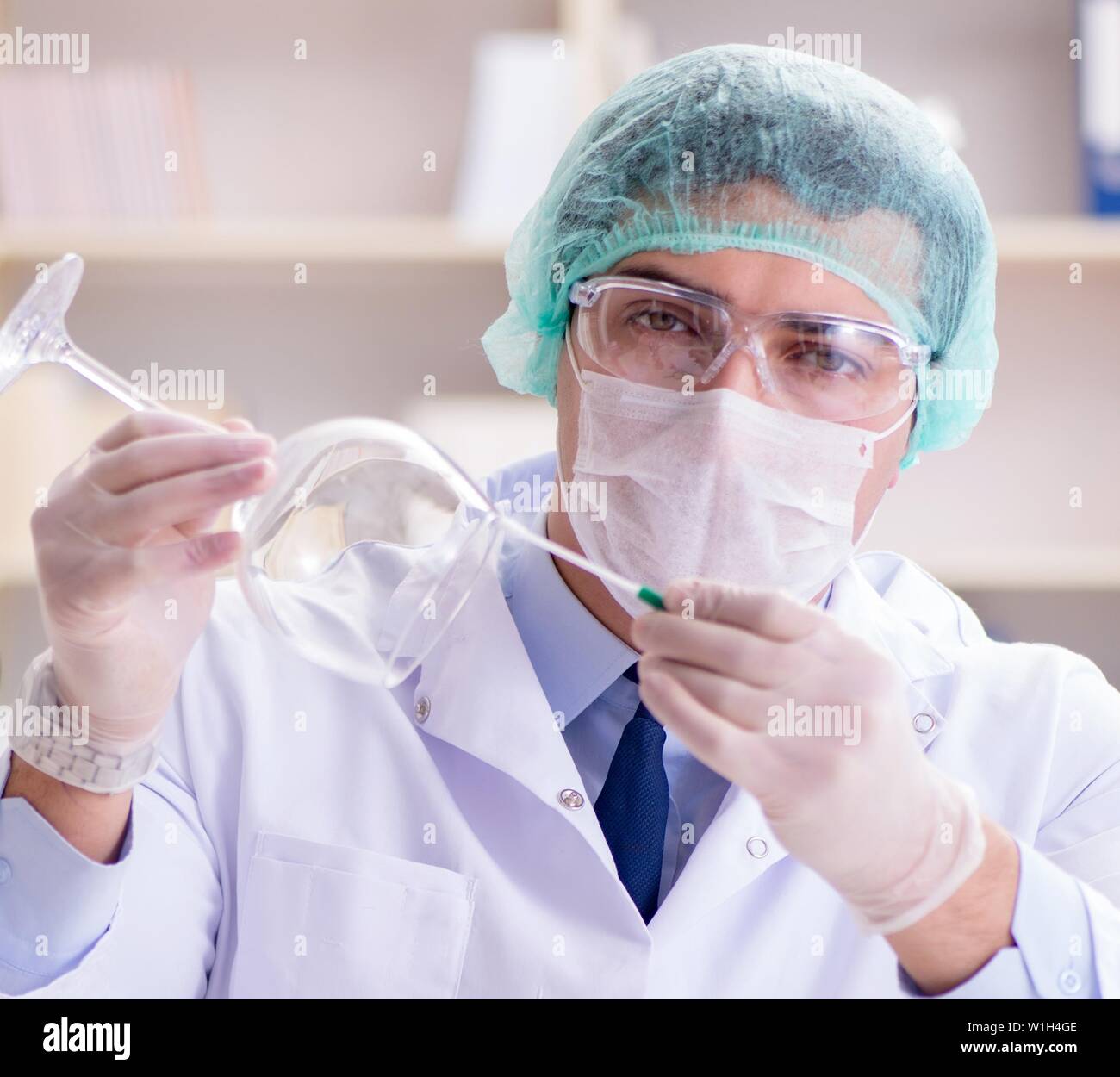 Forensic scientist analysing dna hi-res stock photography and images ...