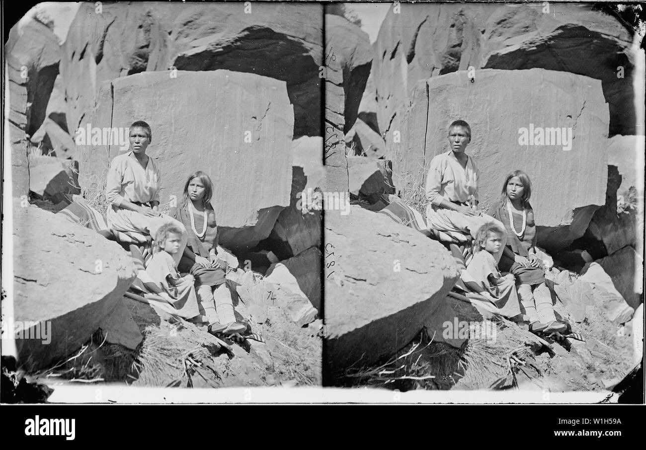 Navajoe squaws and child. Canyon De Chelle. Arizona 1873 Stock Photo ...