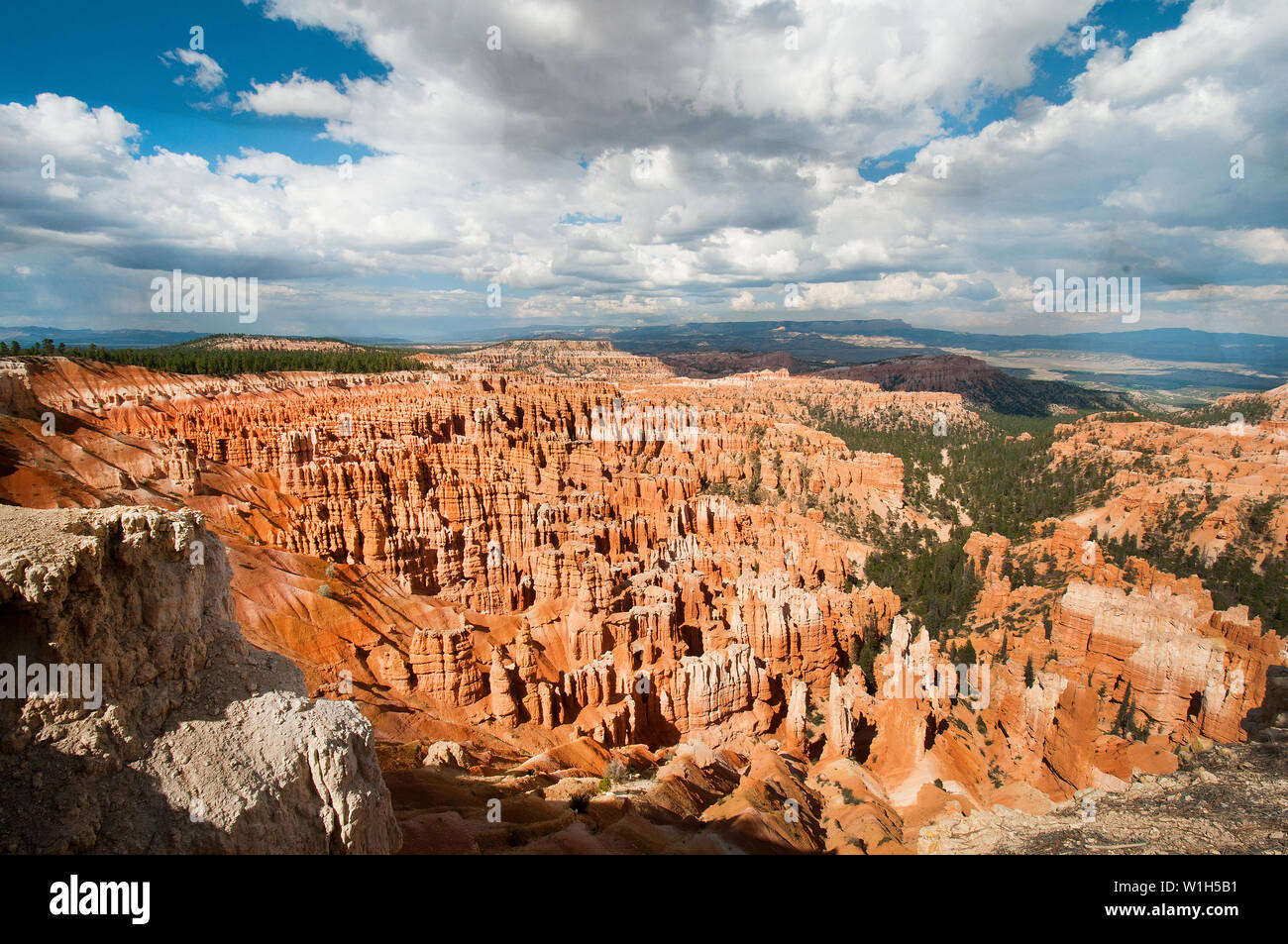 Storm clouds gather over the redrock spires of Bryce Canyon National ...