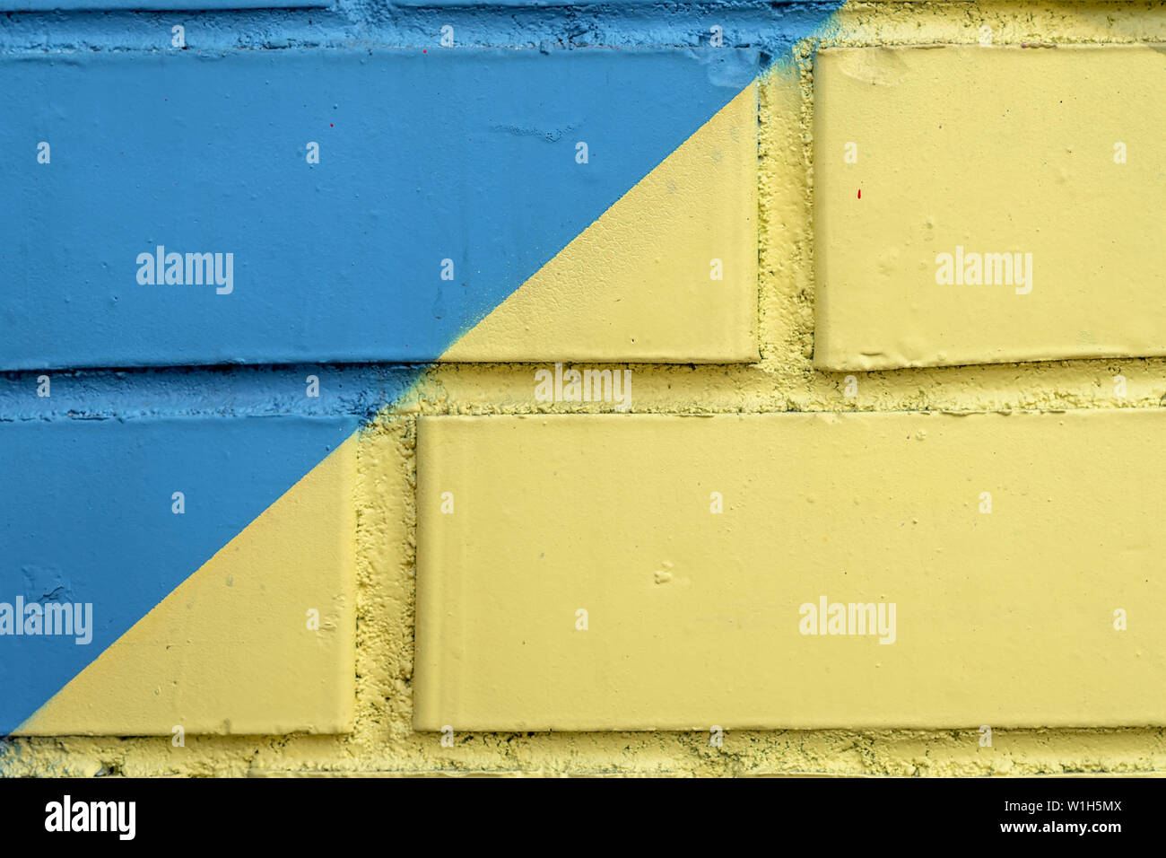 Detail of cracked old brick wall, old chipped paint, scratch. Abstract ...