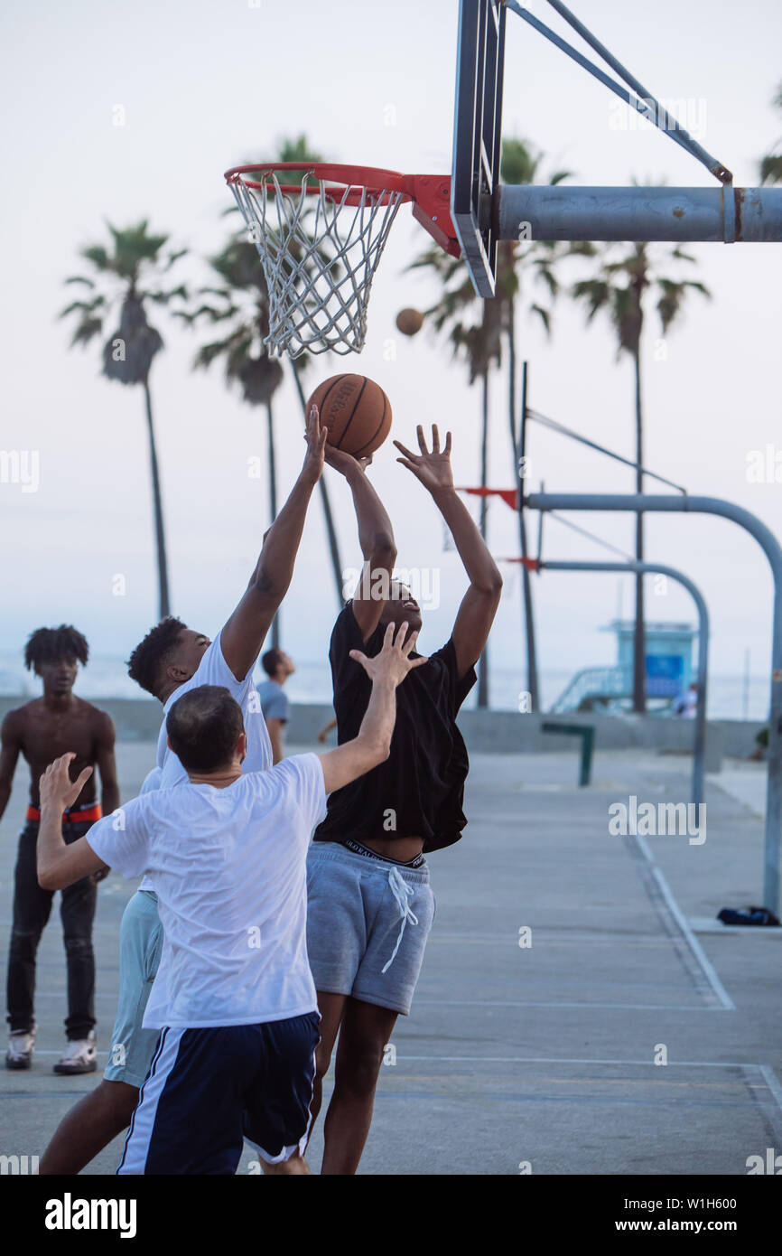 People Playing Street Basketball