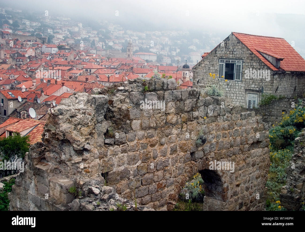 A bombed out building stands above the old town of Dubrovnik, Croatia ...