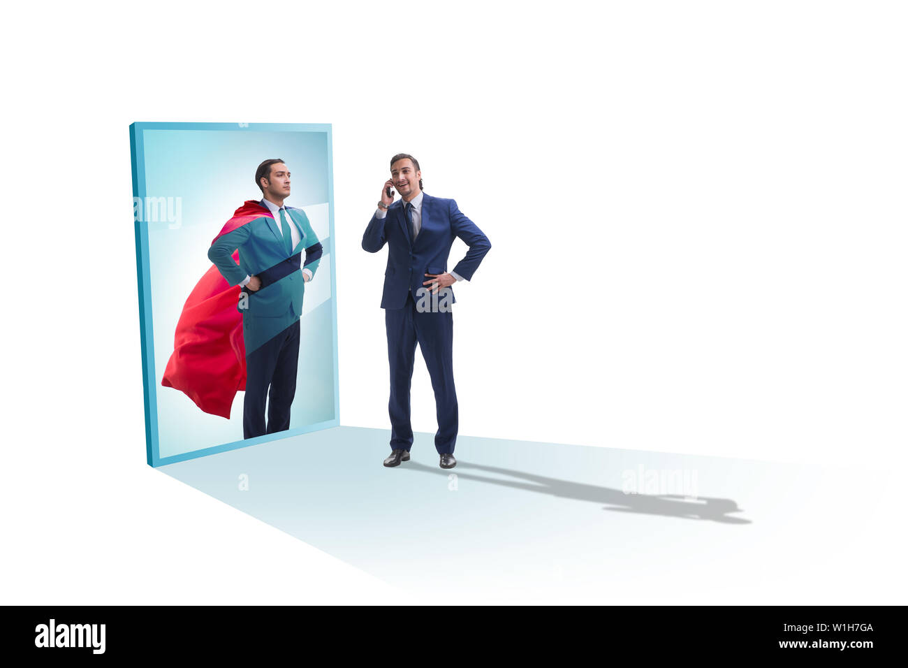 Businessman seeing himself in mirror as superhero Stock Photo - Alamy