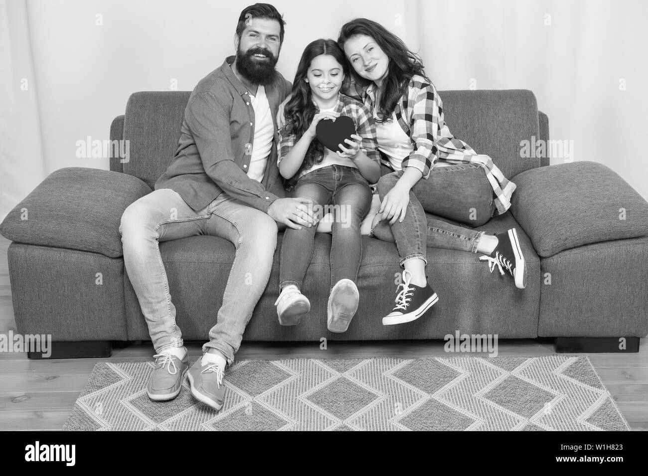 Enjoying every moment together. bearded man and woman with child hold ...