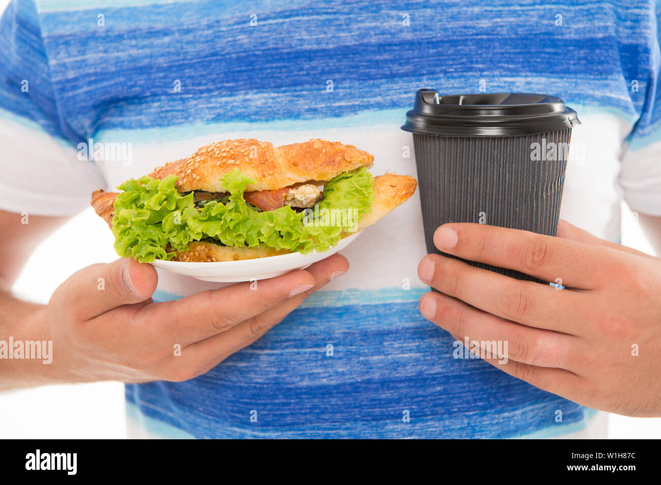 Quick snack. Coffee and croissant. Junk food. Calories and dieting ...