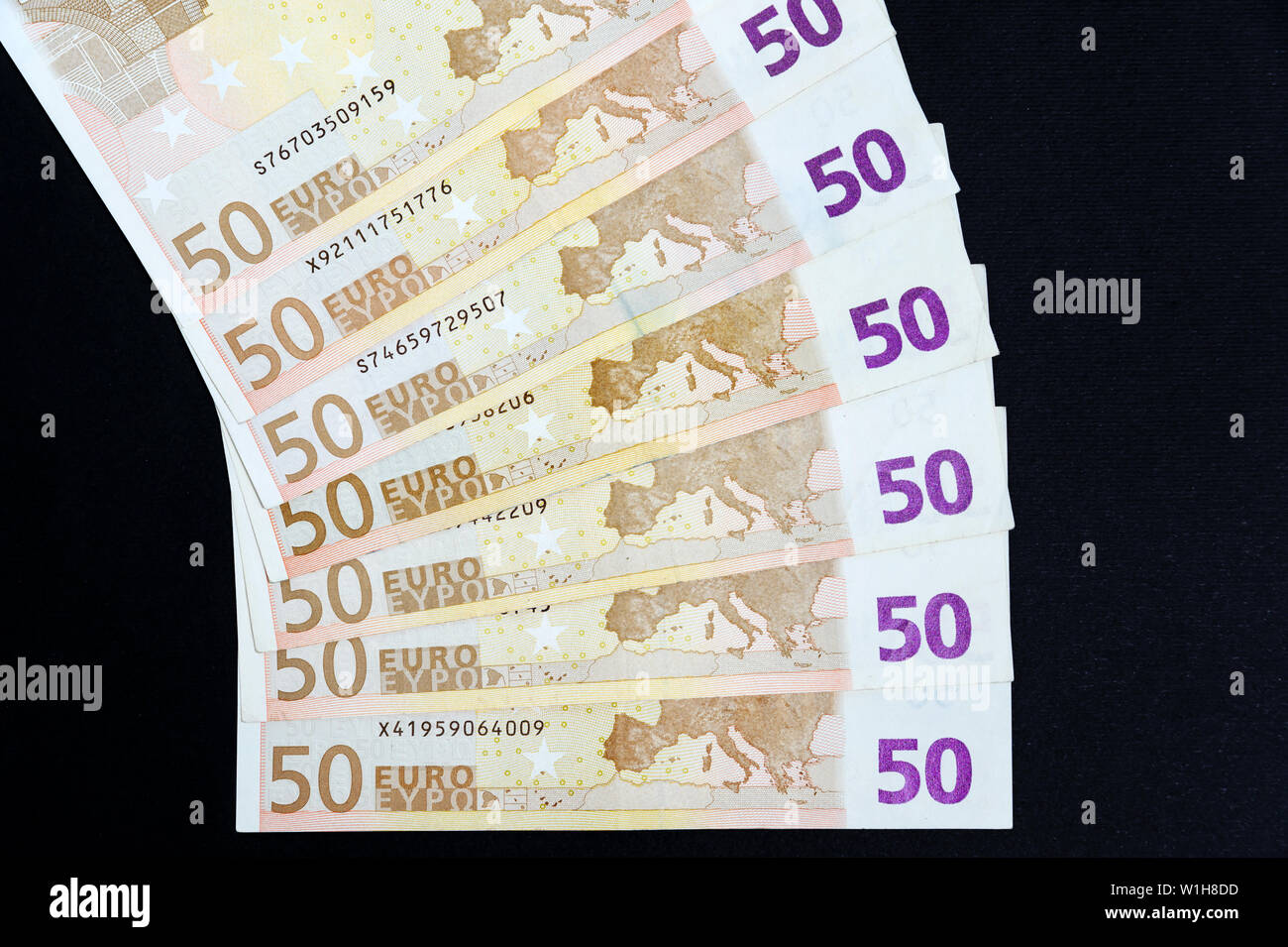 Euro banknotes of different values are laid out in a semicircle on the ...