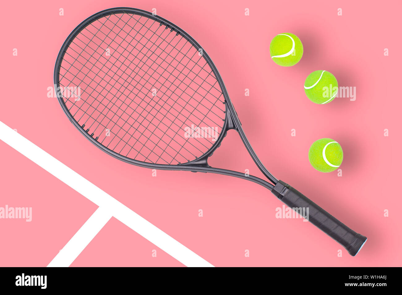 Tennis racket and ball sports on pastel pink background Stock Photo - Alamy
