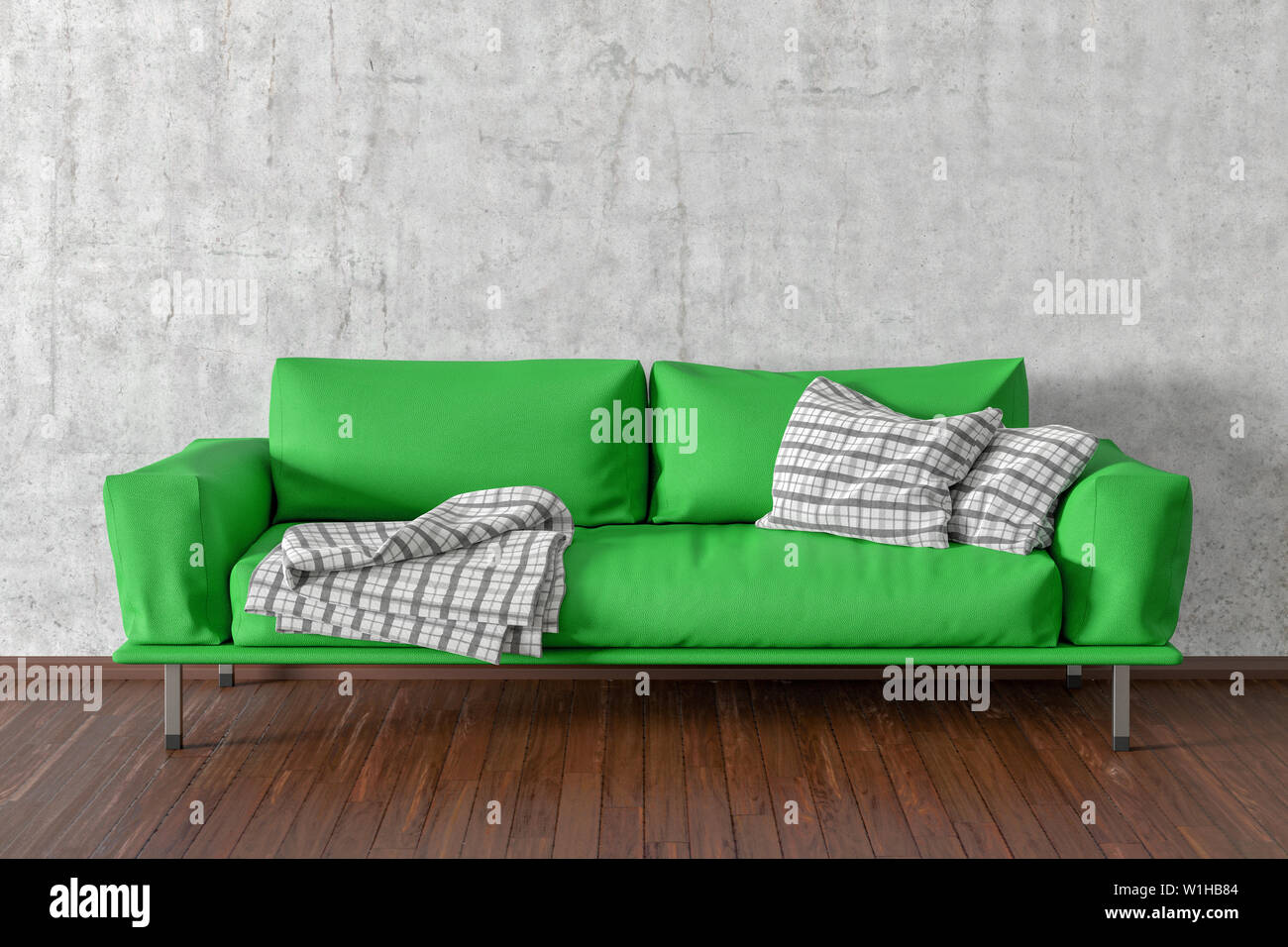 Green leather couch in interior of living room with wooden flooring and ...