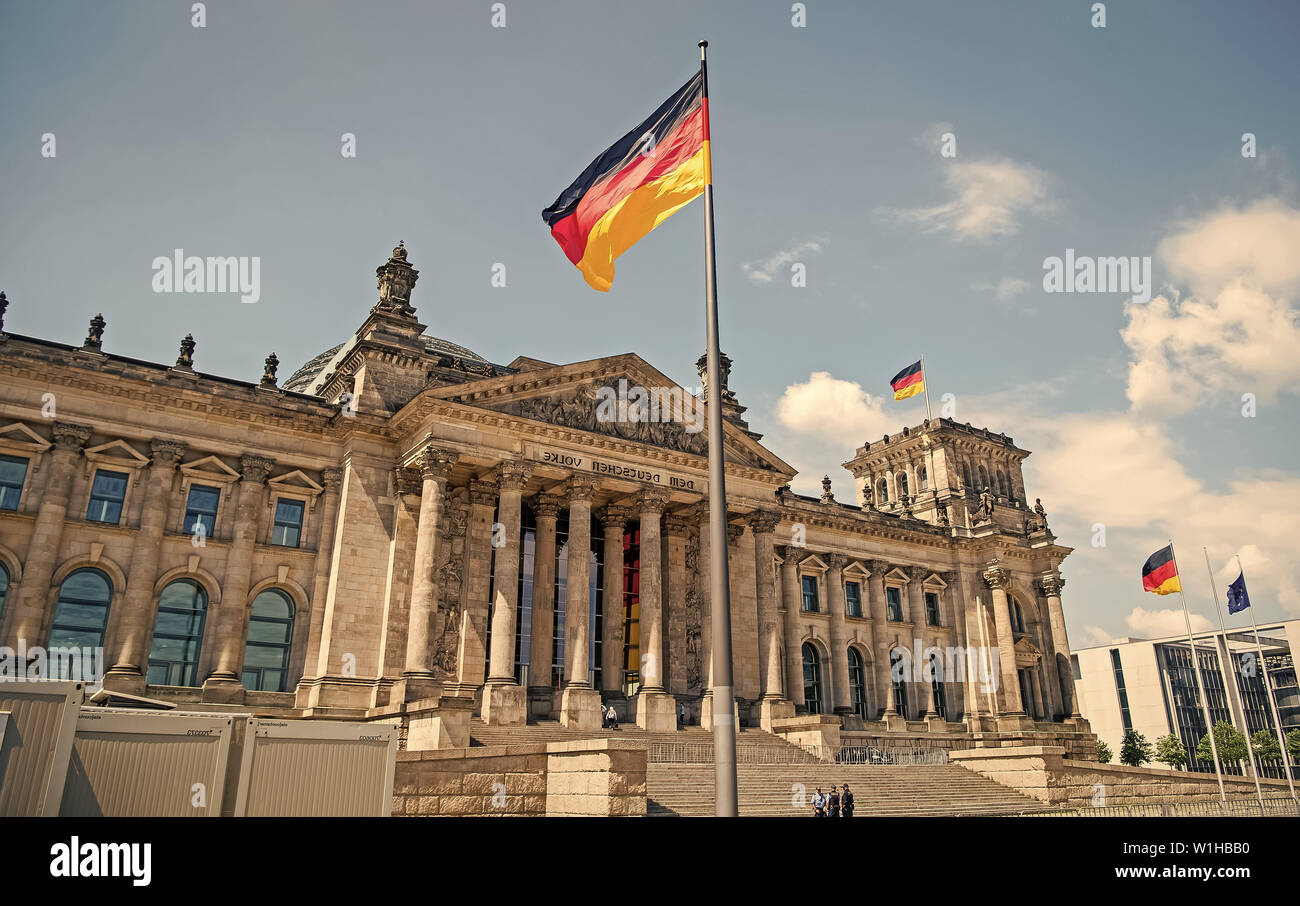 German flag flying on the historic building hi-res stock photography ...