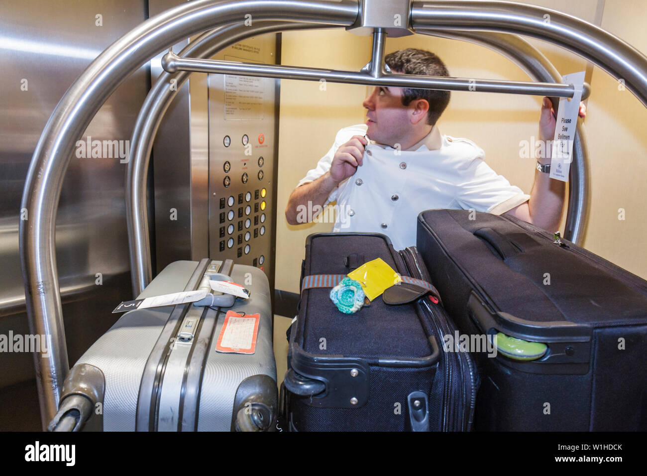 Hotel guest luggage staff hi-res stock photography and images - Alamy